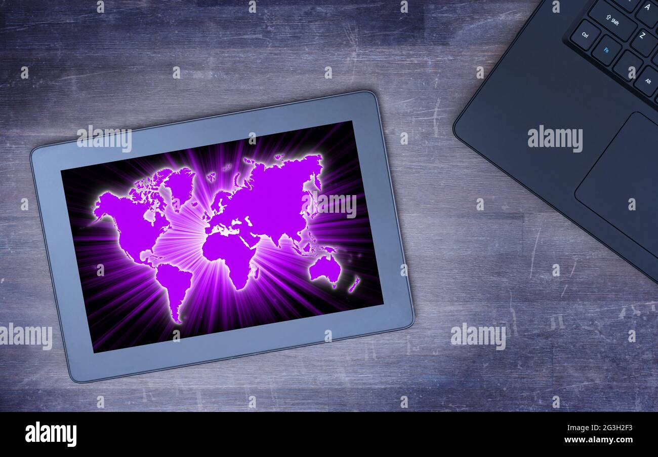 World map on a tablet Stock Photo - Alamy