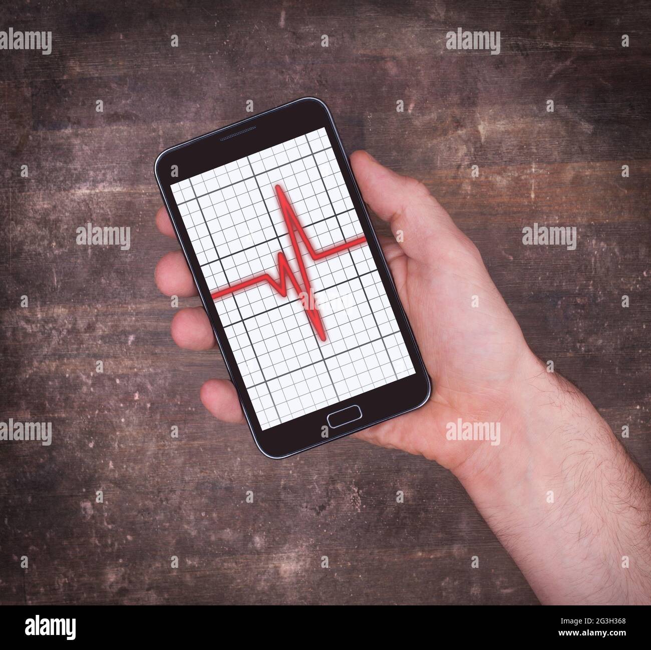 Electrocardiogram on a smartphone - Concept of healthcare Stock Photo ...