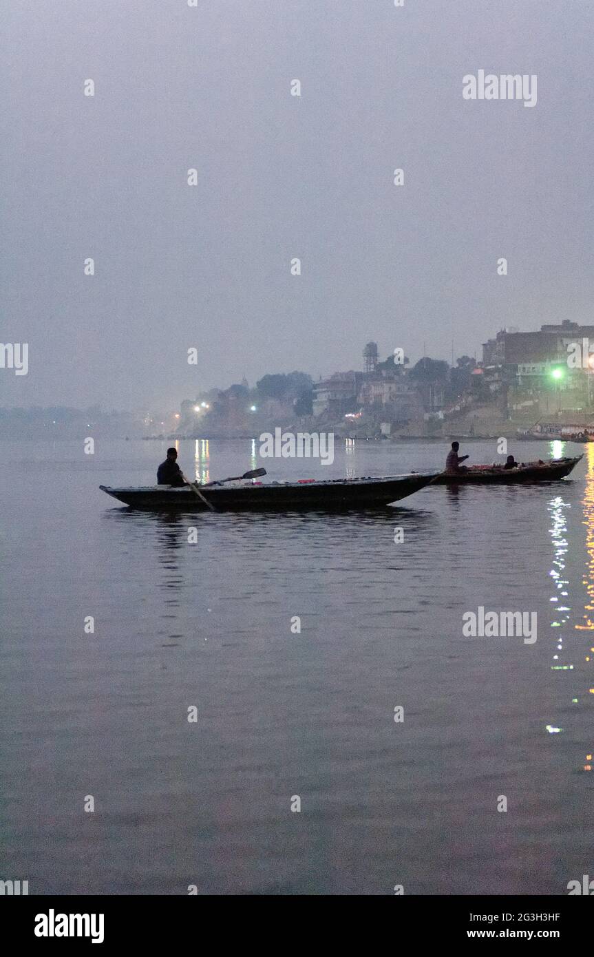 Rowing boat on the river ganges ganga at Varanasi, Uttar Pradesh, India ...