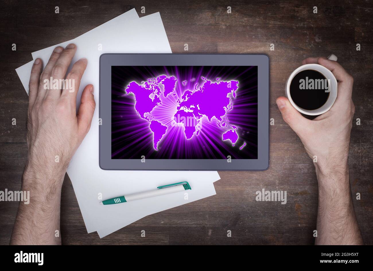 World map on a tablet Stock Photo - Alamy