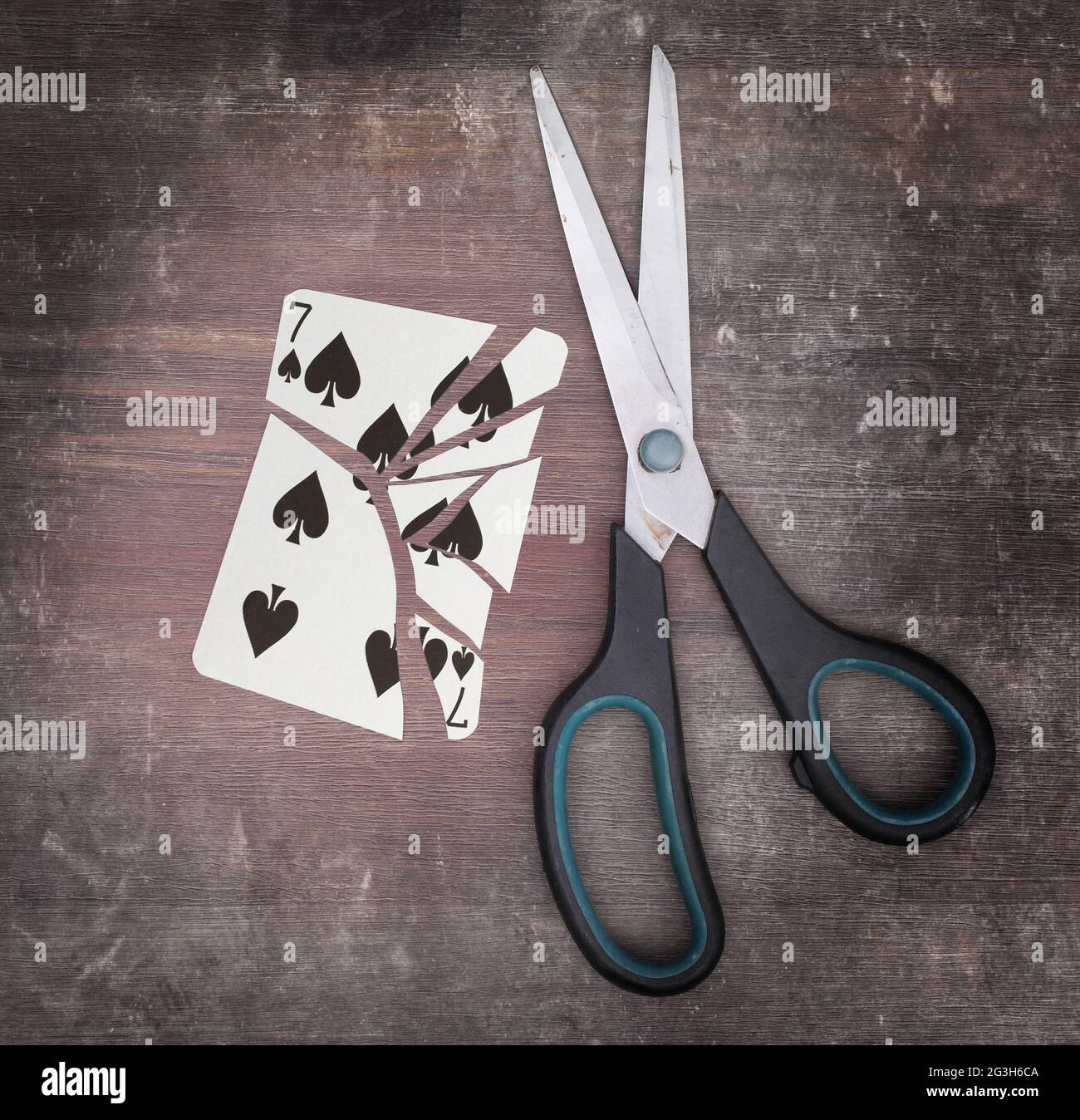 Concept of addiction, card with scissors Stock Photo - Alamy