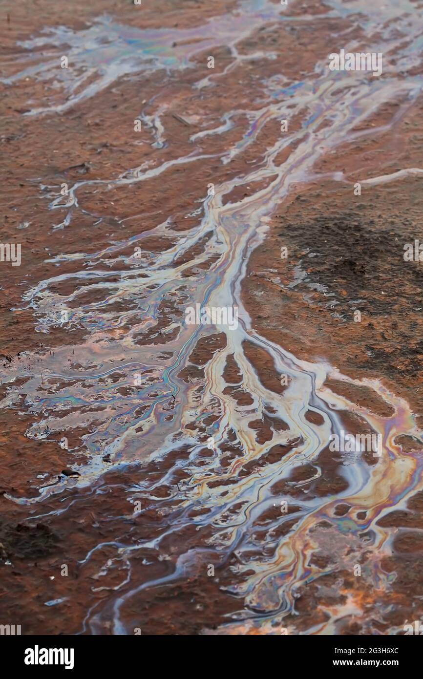 Oil Slick on a beach close up Stock Photo - Alamy