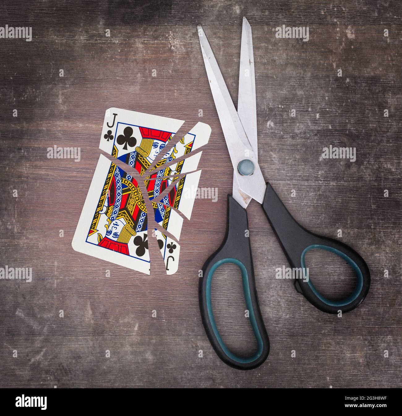 Concept of addiction, card with scissors Stock Photo - Alamy