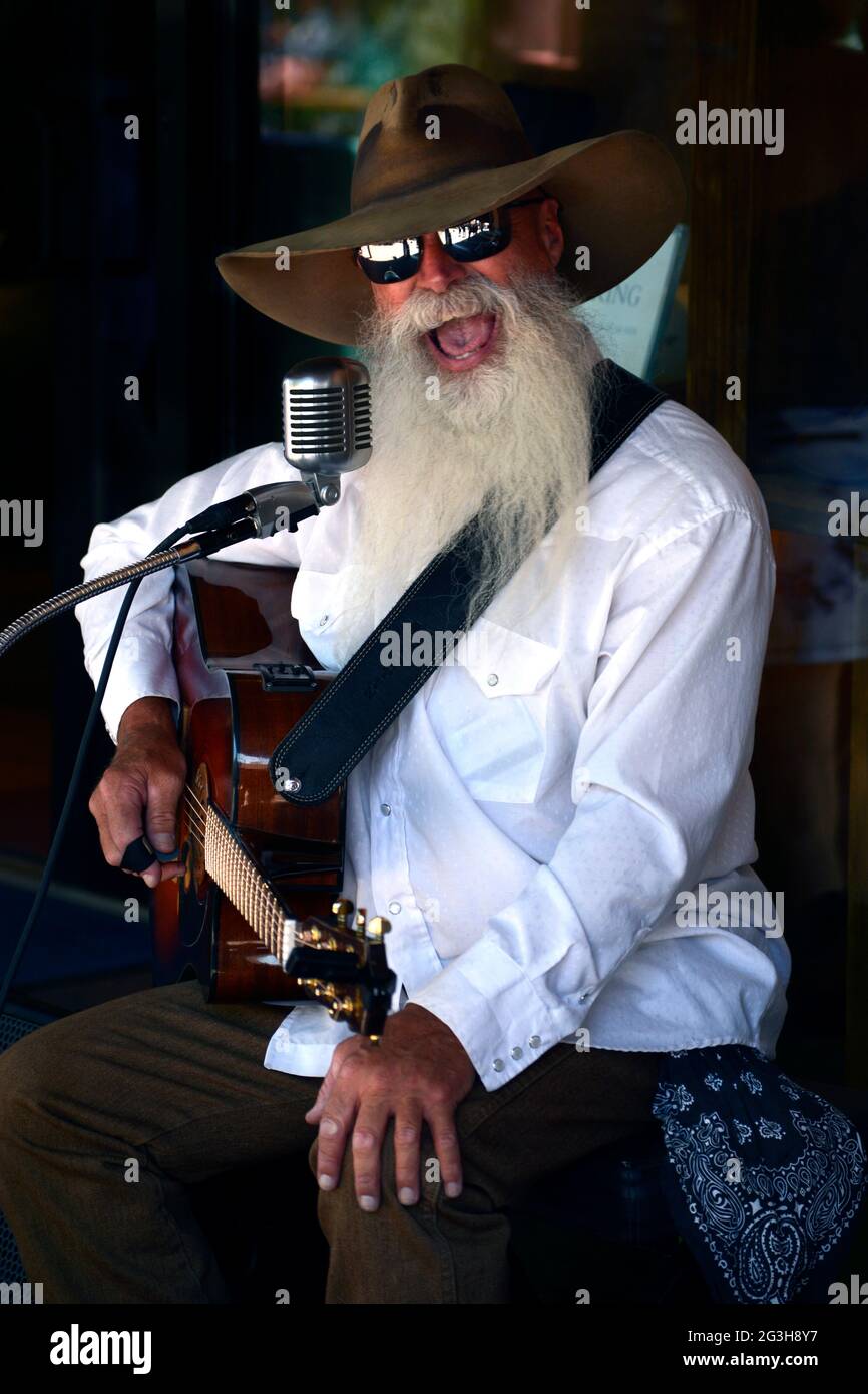 Johnny Lloyd, a well-known local street musician and busker, performs ...