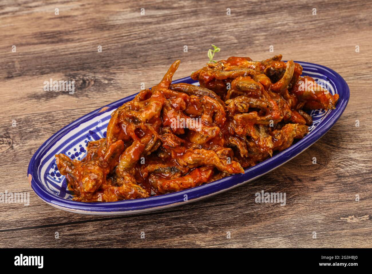 Canned anchovy snack in tomato sauce Stock Photo - Alamy