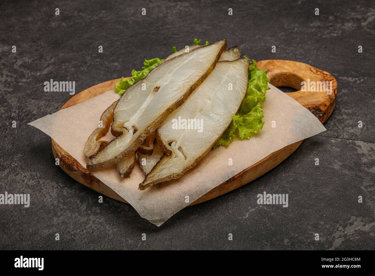 Delicous smoked halibut fish slices snack Stock Photo - Alamy