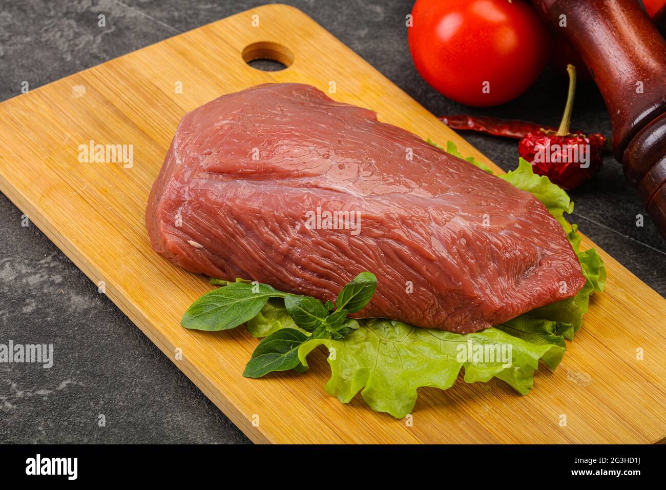 Raw beef meat piece for cooking Stock Photo - Alamy