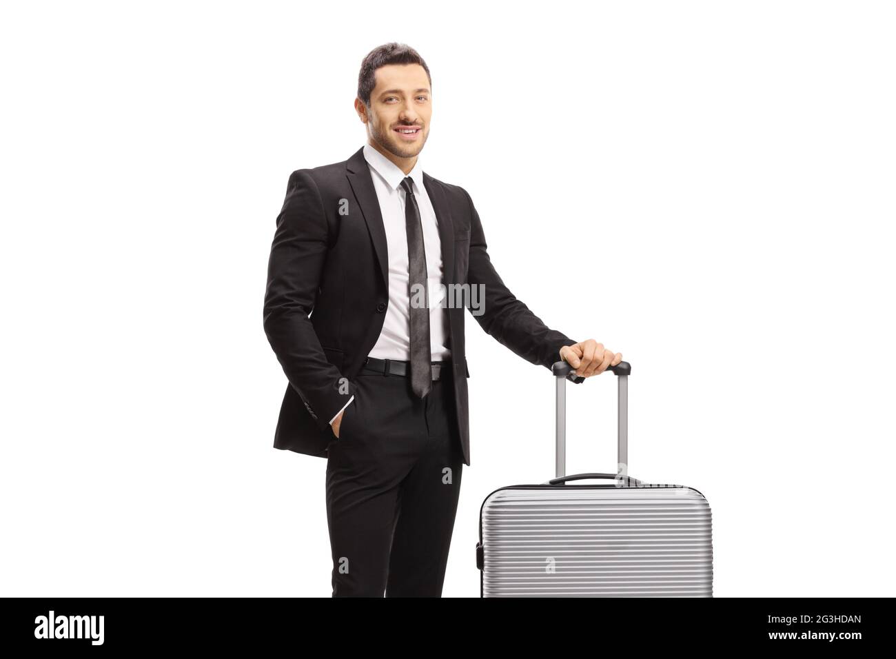 Businessman posing with a suitcase isolated on white background Stock ...