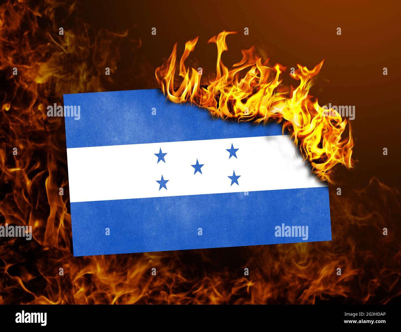 Flag burning - Honduras Stock Photo - Alamy