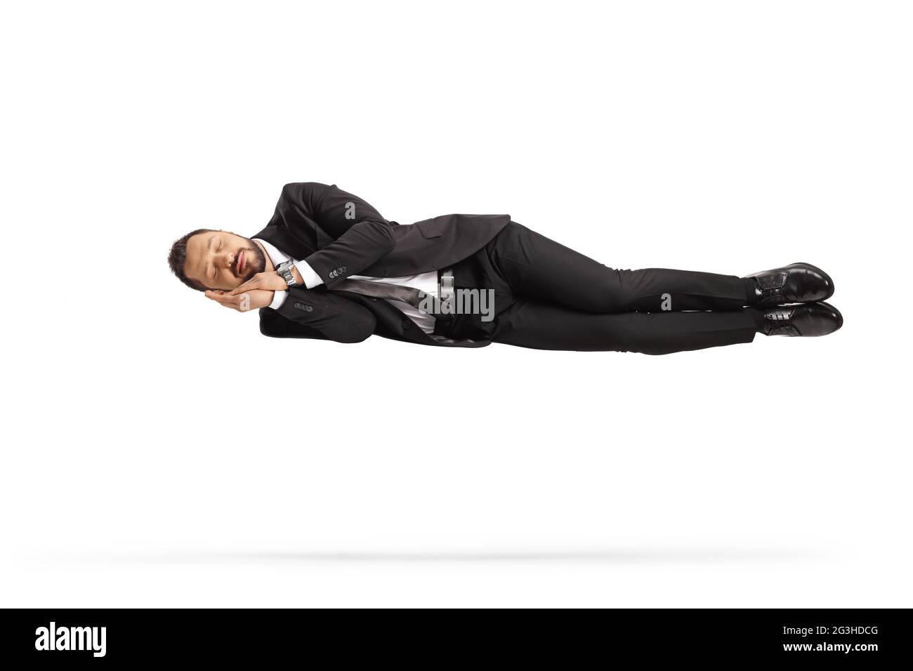 Businessman floating and sleeping in air isolated on white background ...