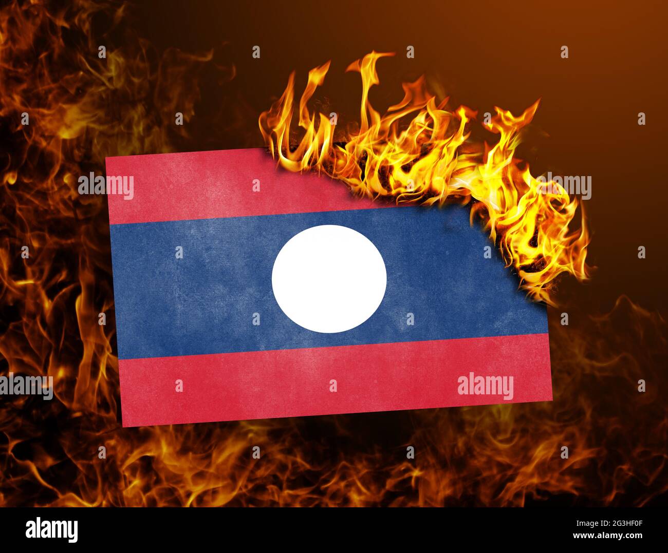 Flag burning - Laos Stock Photo - Alamy