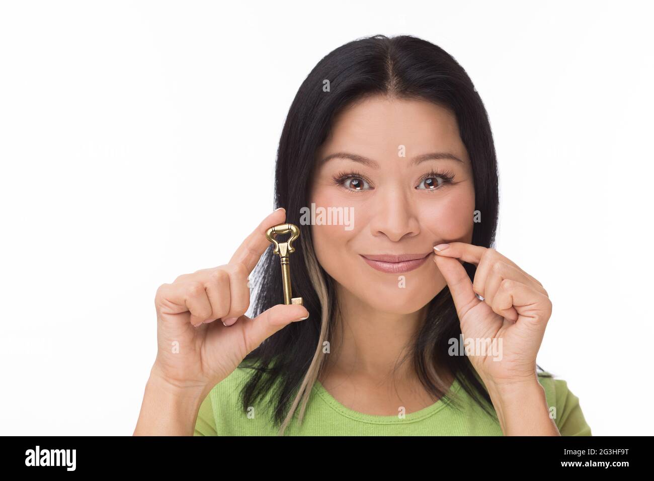 Woman locked mouth with key on white Stock Photo - Alamy