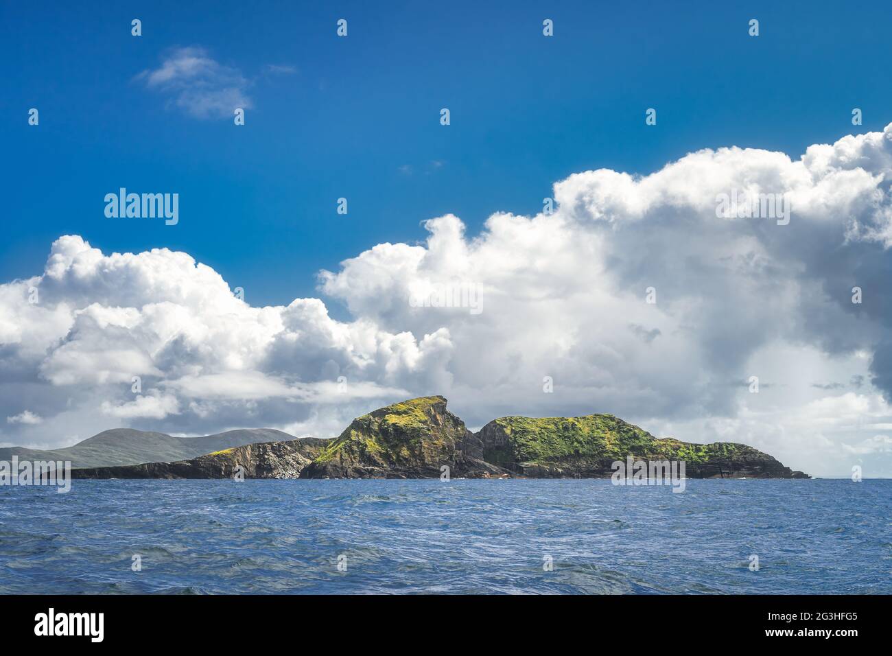 Beautiful, rough Irish coastline, Kerry Cliffs, seen from boat on ...