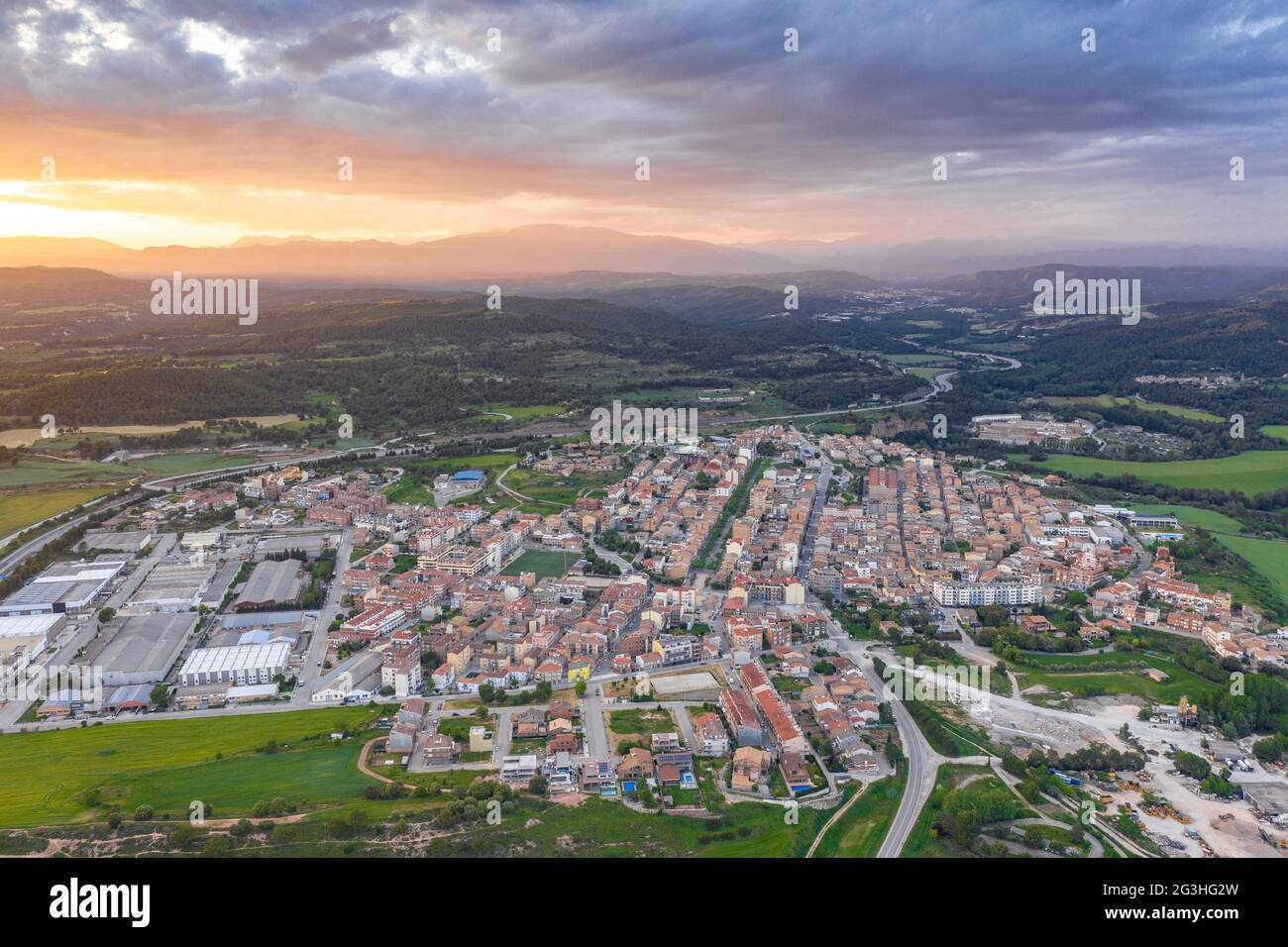 Aerial view of the town of Navàs and the Mujal greenway between spring ...