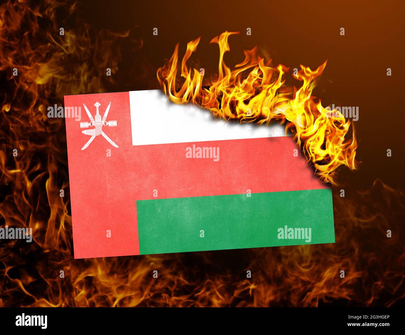Flag burning - Oman Stock Photo - Alamy