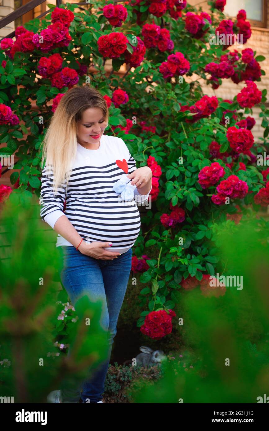 Family enjoying pregnancy. The concept of Mother's Day and Women's Day ...