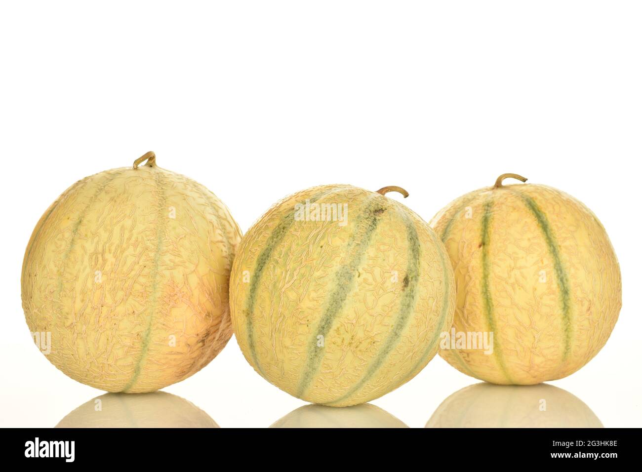 Three fragrant organic melons, close-up, on a white background Stock ...