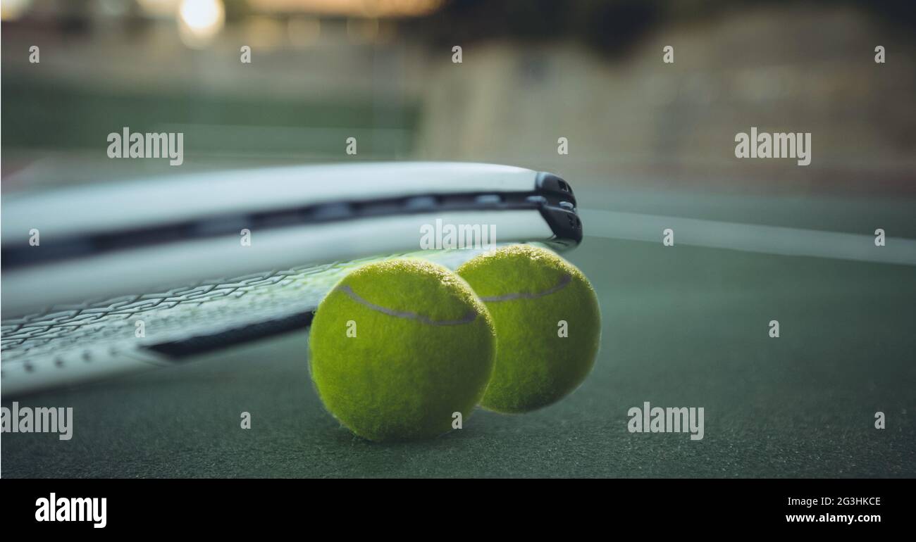 Composition of two tennis balls and racket with copy space on tennis ...