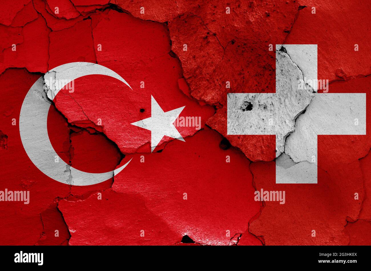 flags of Turkey and Switzerland painted on cracked wall Stock Photo - Alamy