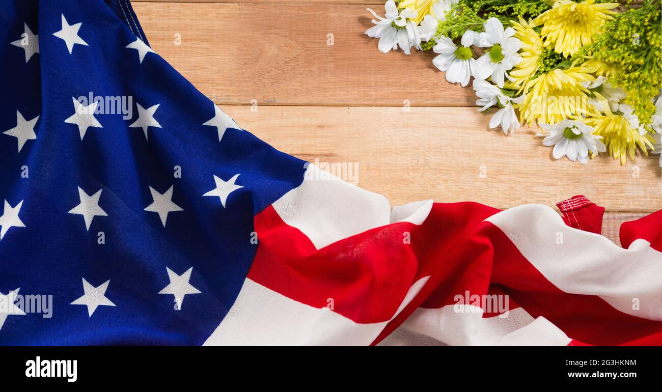 American flag and bunch of flowers on wooden background Stock Photo - Alamy