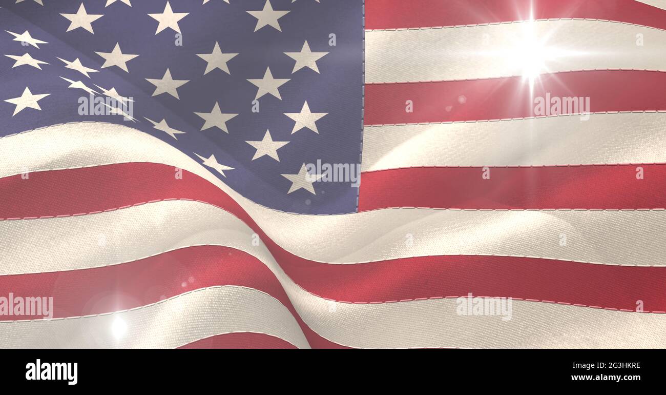 Bright spot of light against waving american flag Stock Photo - Alamy