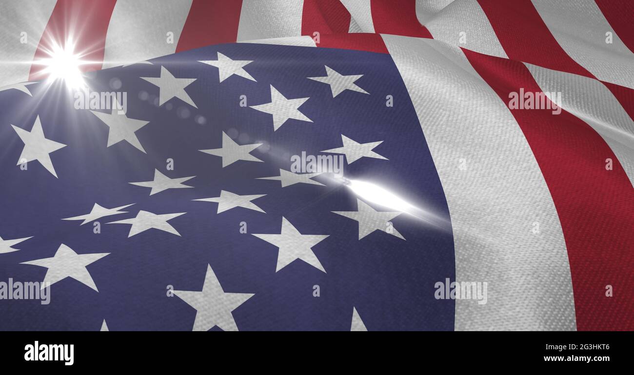 Bright spot of light against waving american flag Stock Photo - Alamy