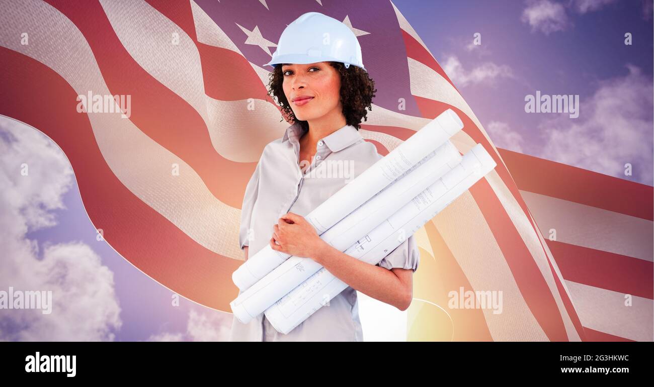 Composition of smiling female architect in hard hat, over billowing ...