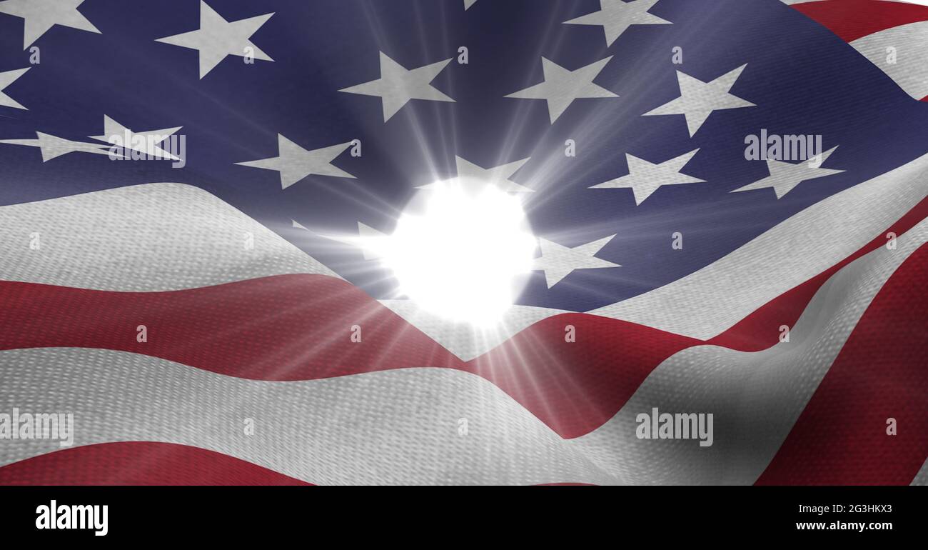 Bright spot of light against waving american flag Stock Photo - Alamy