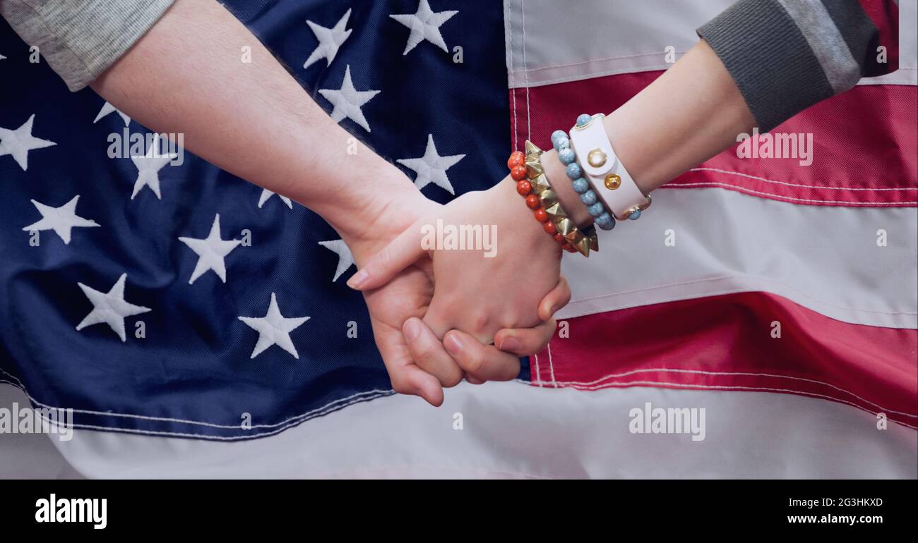 Composition hand holding american flag hi-res stock photography and ...