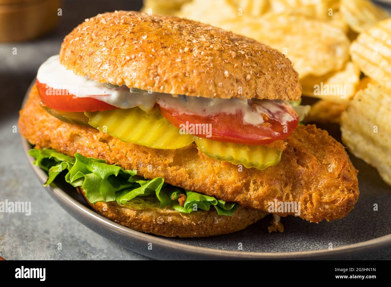 Homemade Crispy Fried Fish Fillet Sandwich with Chips Stock Photo - Alamy