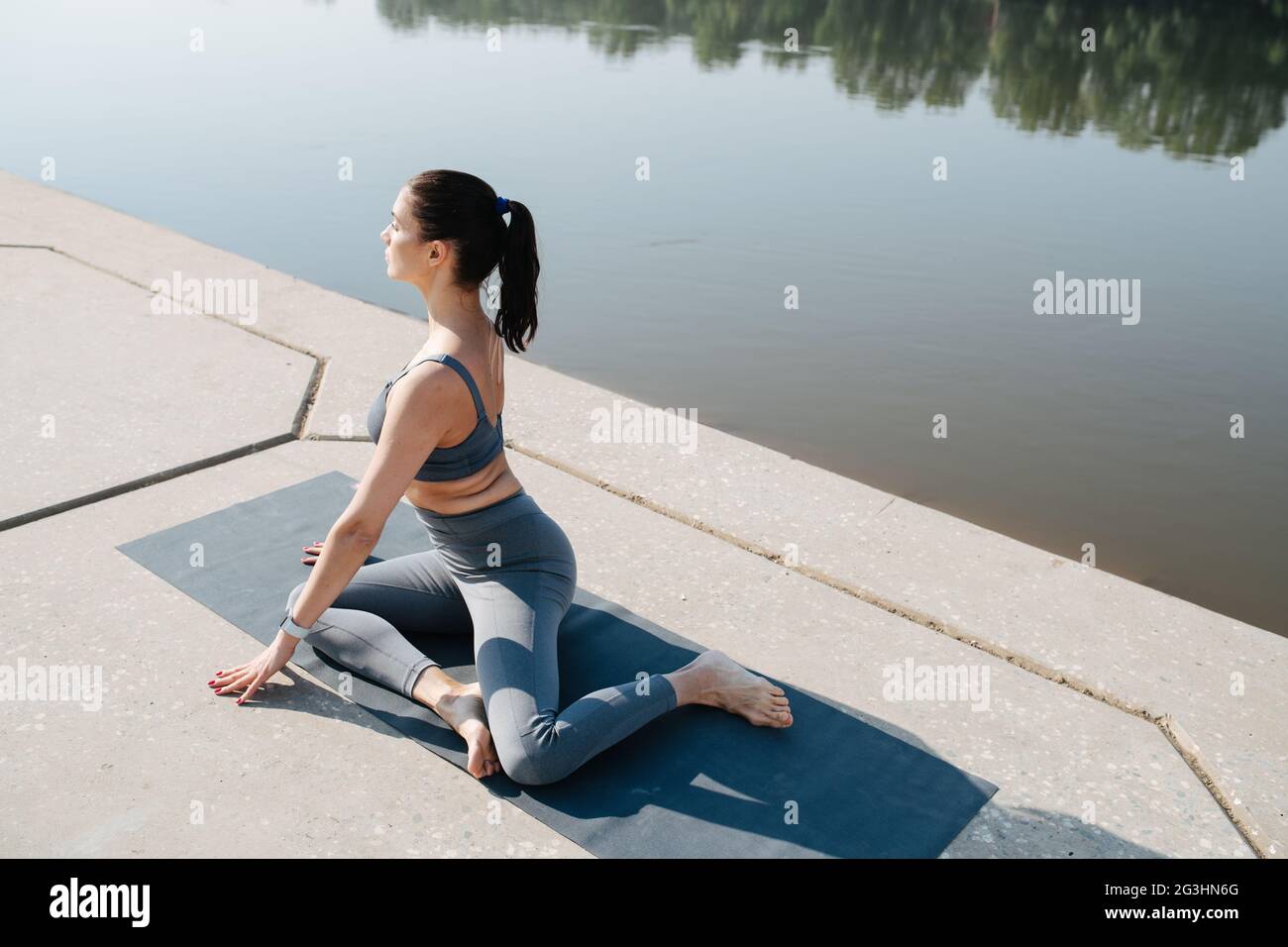 Slim beautiful yoga asana woman girl hi-res stock photography and ...
