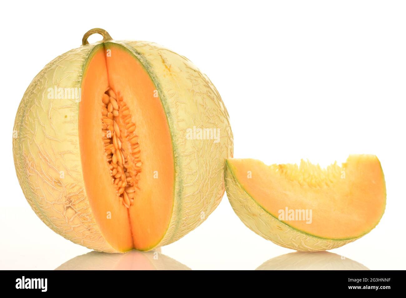 One sliced fragrant juicy organic melon, close-up, over white ...