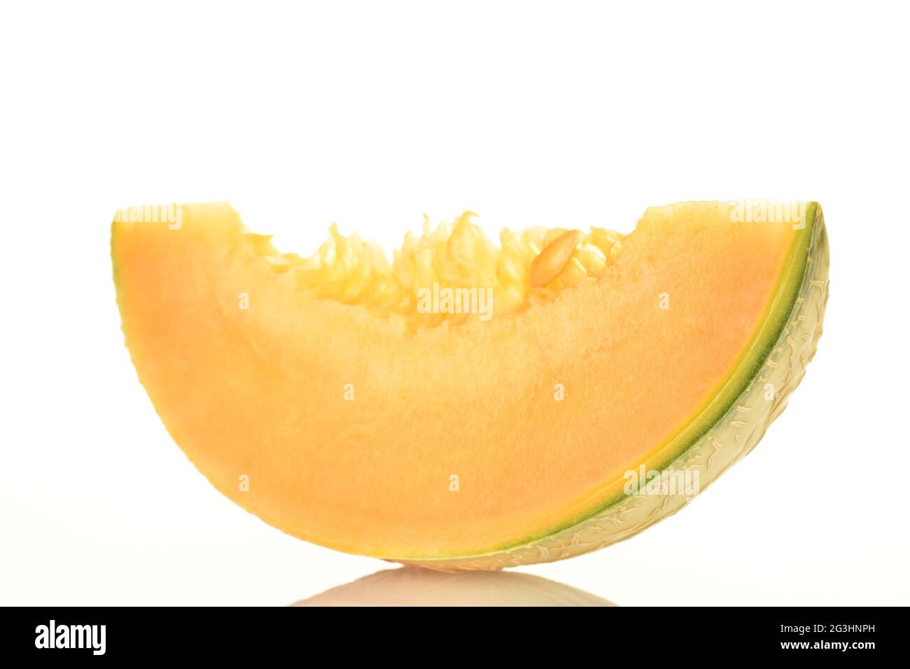 One slice of fragrant juicy organic melon, close-up, over white ...