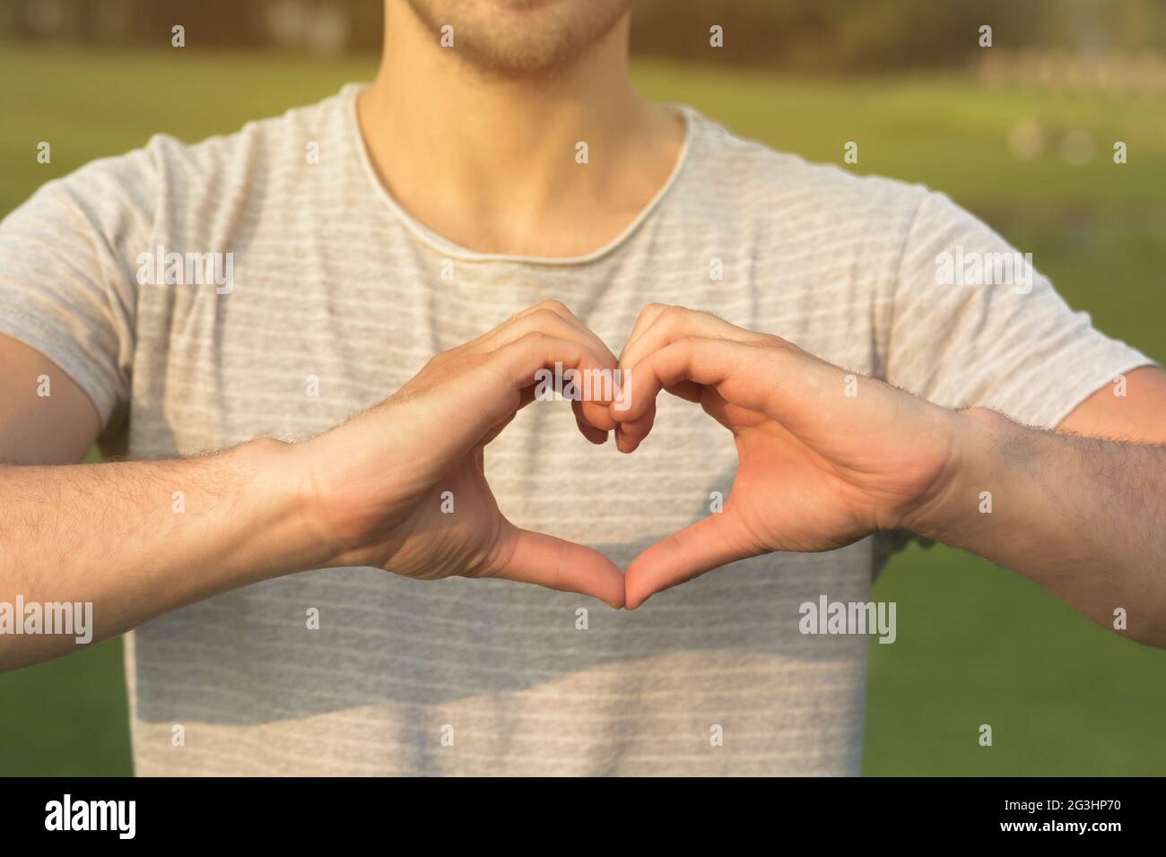 Heart with hands Stock Photo - Alamy