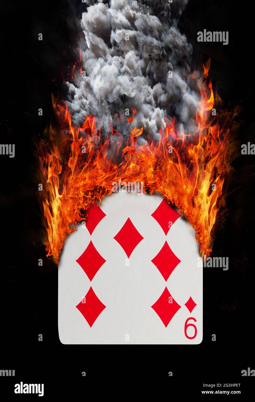 Playing card with fire and smoke Stock Photo - Alamy