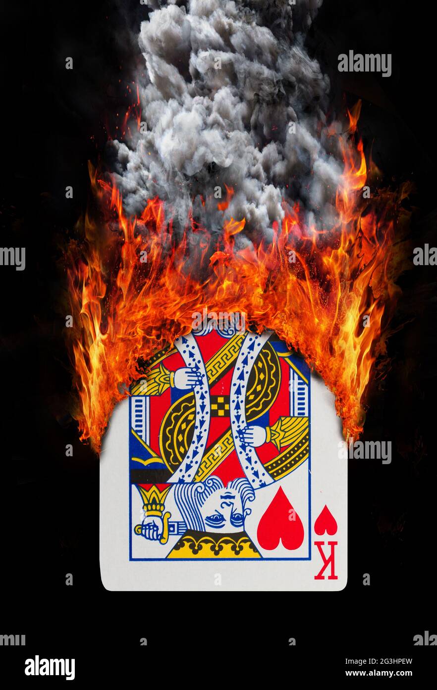 Playing card with fire and smoke Stock Photo - Alamy