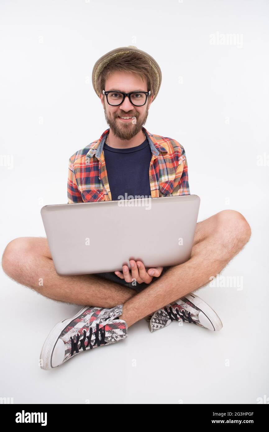 Bearded man with laptop Stock Photo - Alamy