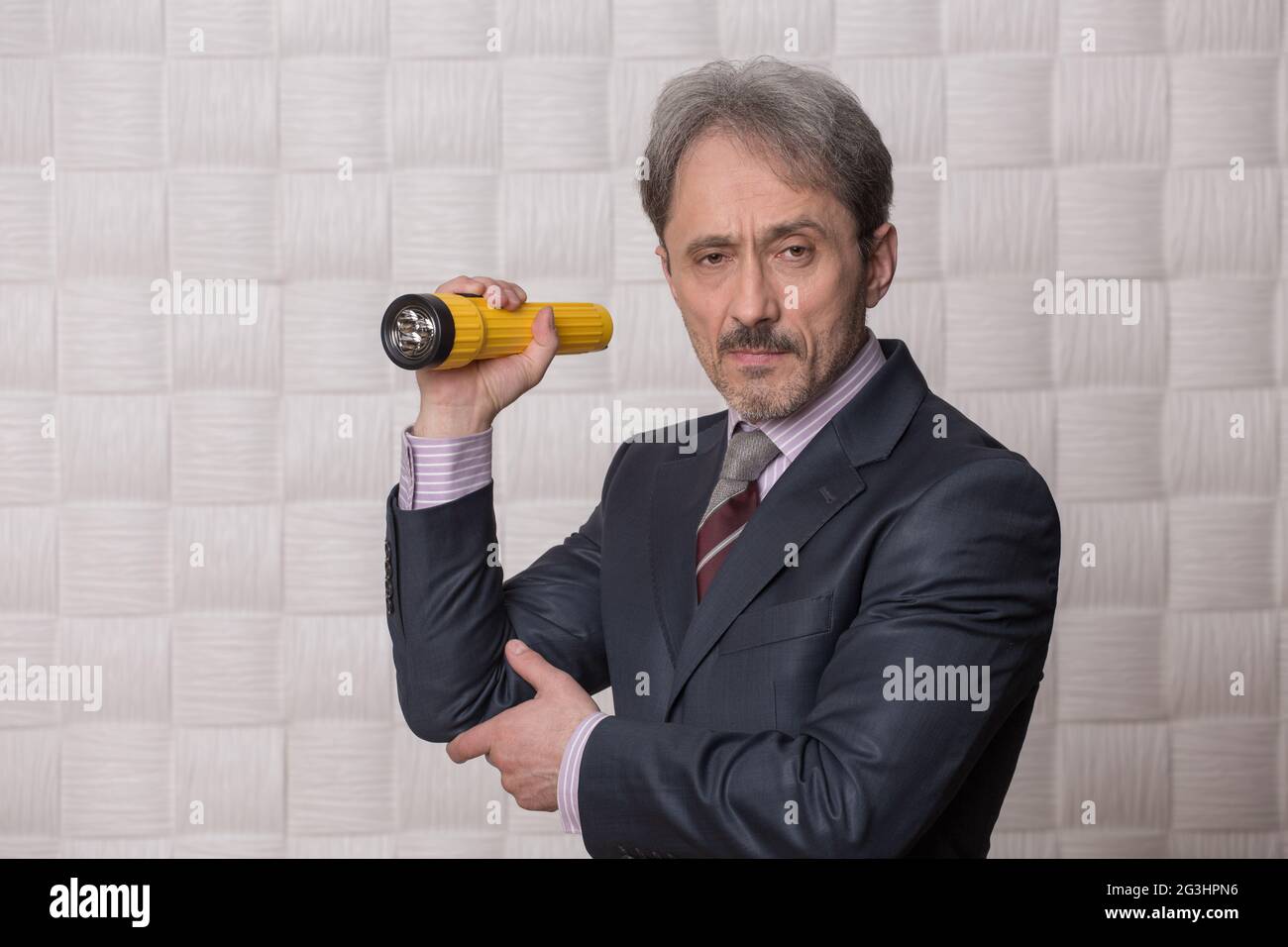 Business man flashlight hi-res stock photography and images - Alamy