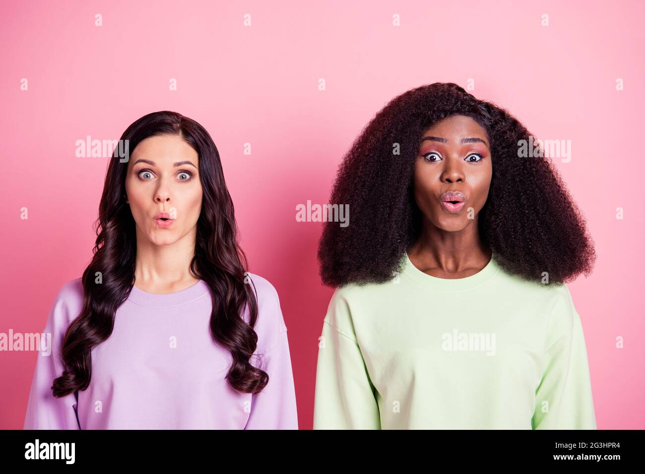 Photo of two shocked crazy ladies staring open mouth wear sweatshirt ...