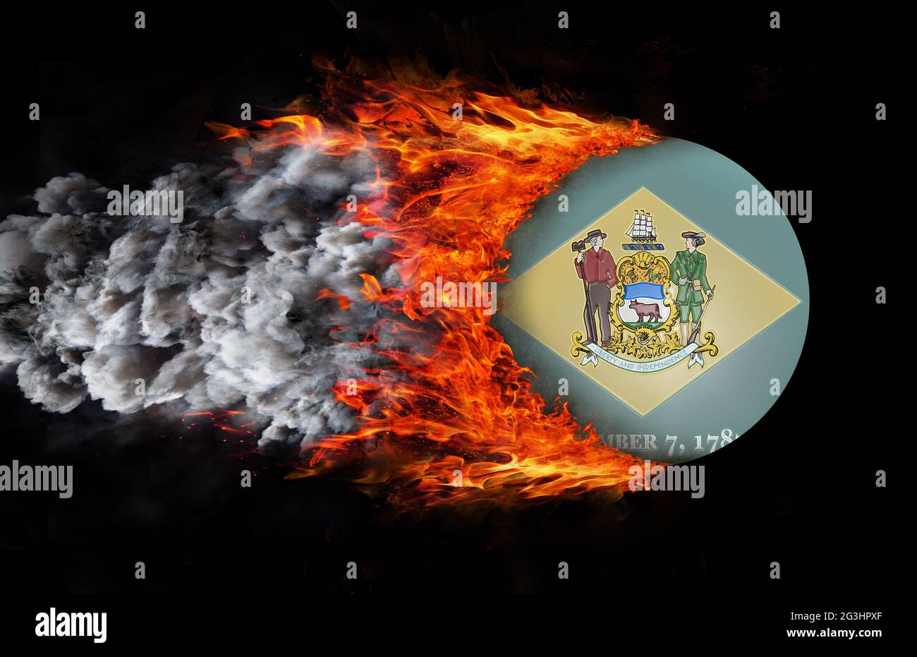 Flag with a trail of fire and smoke - Delaware Stock Photo - Alamy
