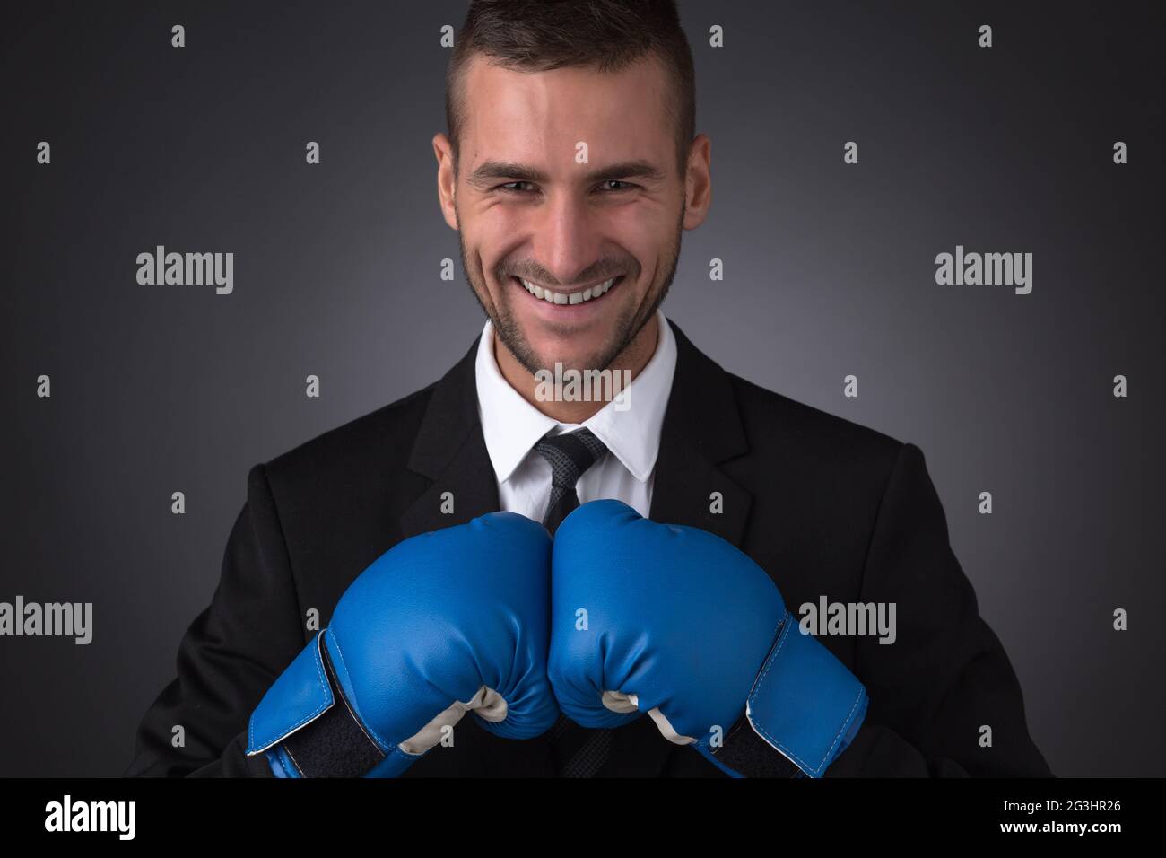 Guy boxing gloves hi-res stock photography and images - Alamy