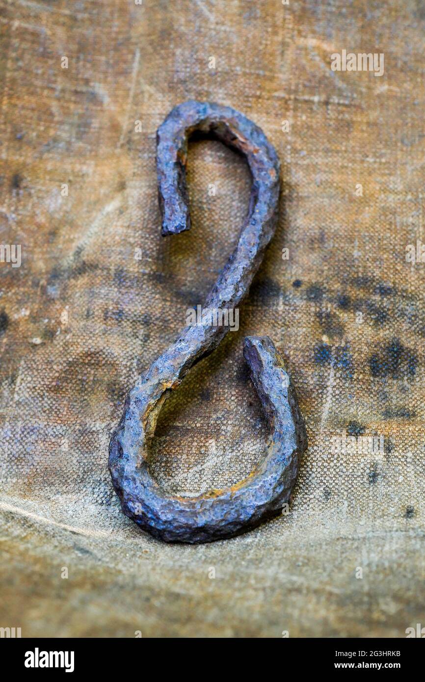 Old rusted metal hook, France Stock Photo - Alamy