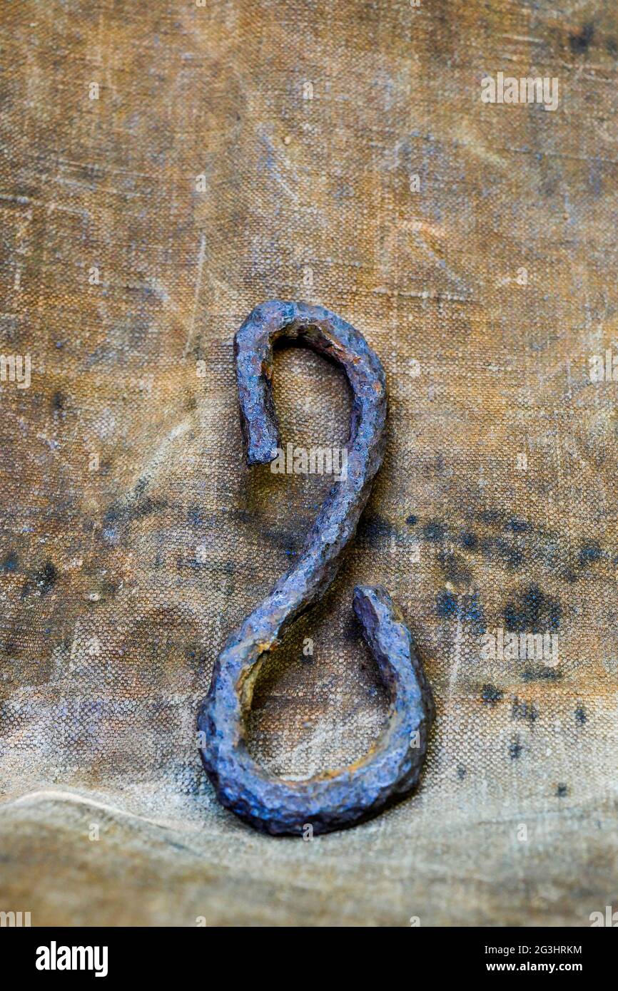 Old rusted metal hook, France Stock Photo - Alamy