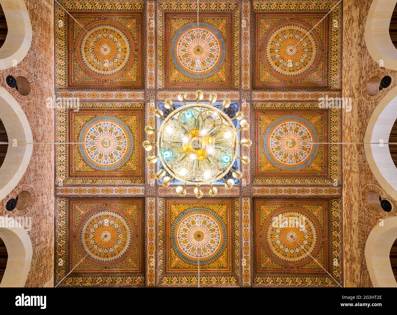 Wooden ceiling decorated with colorful floral patterns and dome at ...