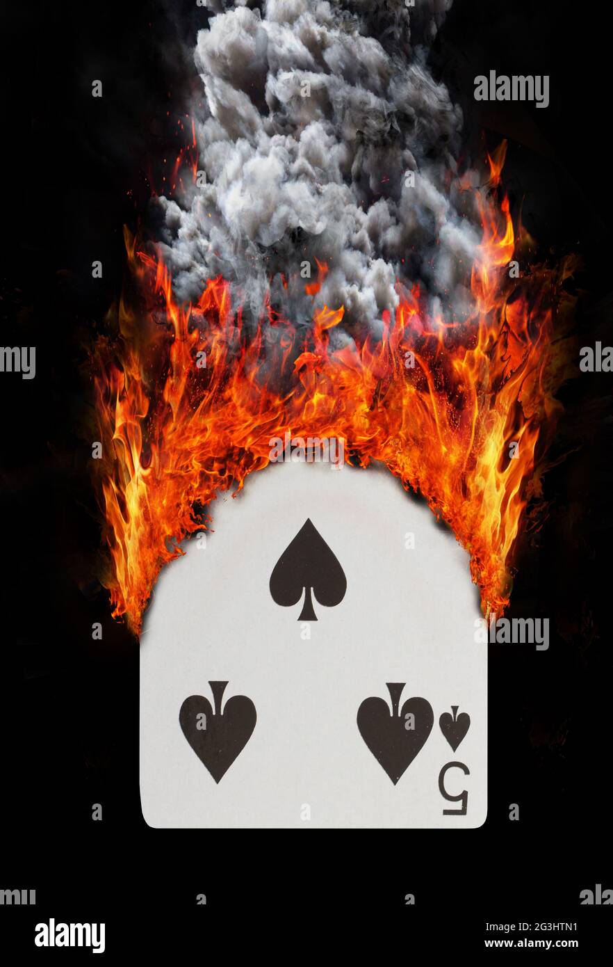 Playing card with fire and smoke Stock Photo - Alamy