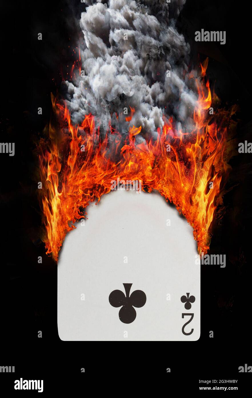 Playing card with fire and smoke Stock Photo - Alamy