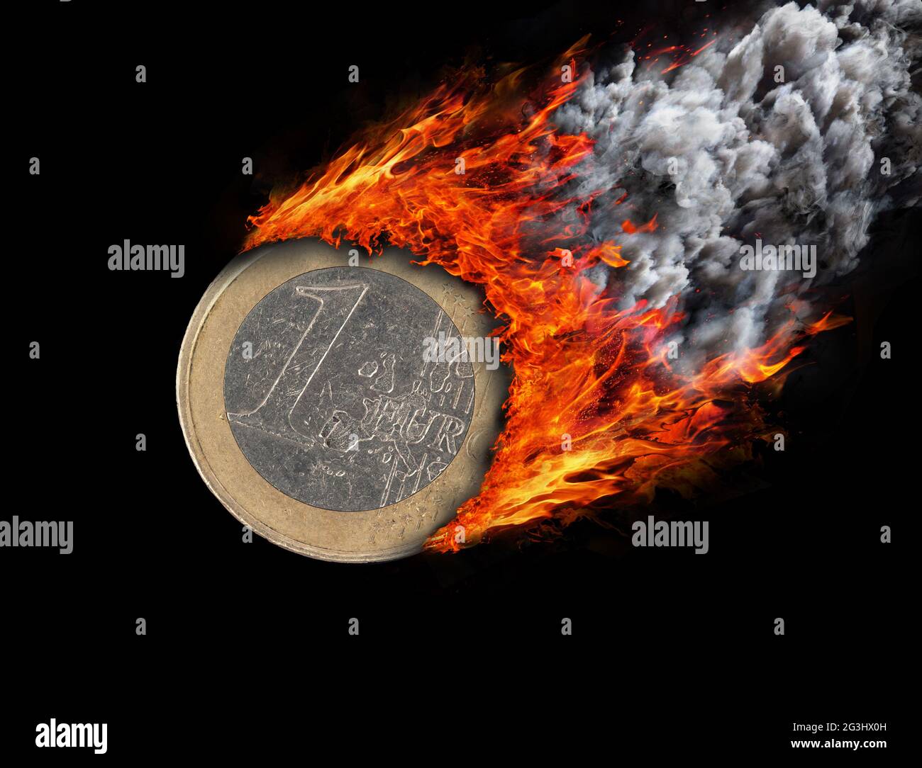 Burning coin with a trail of fire and smoke Stock Photo - Alamy