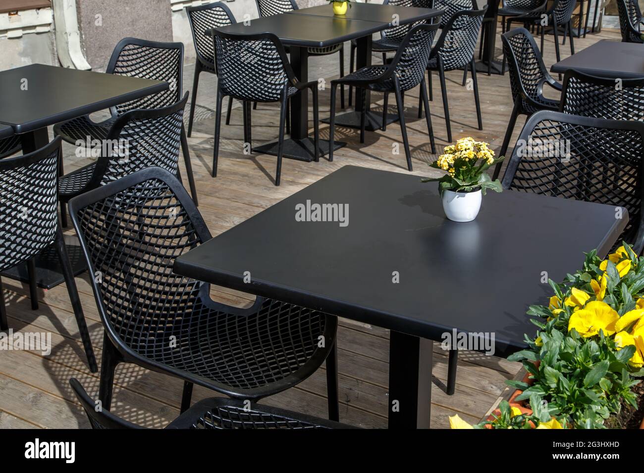 Plastic tables and chairs hi-res stock photography and images - Alamy