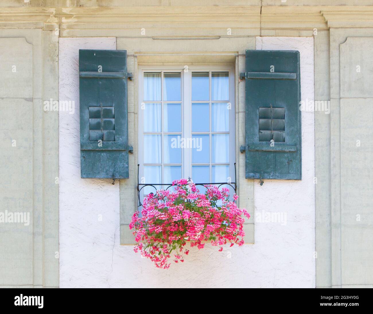 Old window and flowers at a historic building Stock Photo - Alamy