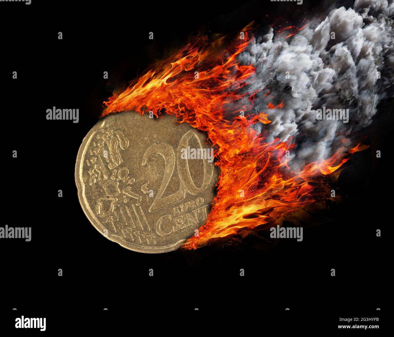 Burning coin with a trail of fire and smoke Stock Photo - Alamy